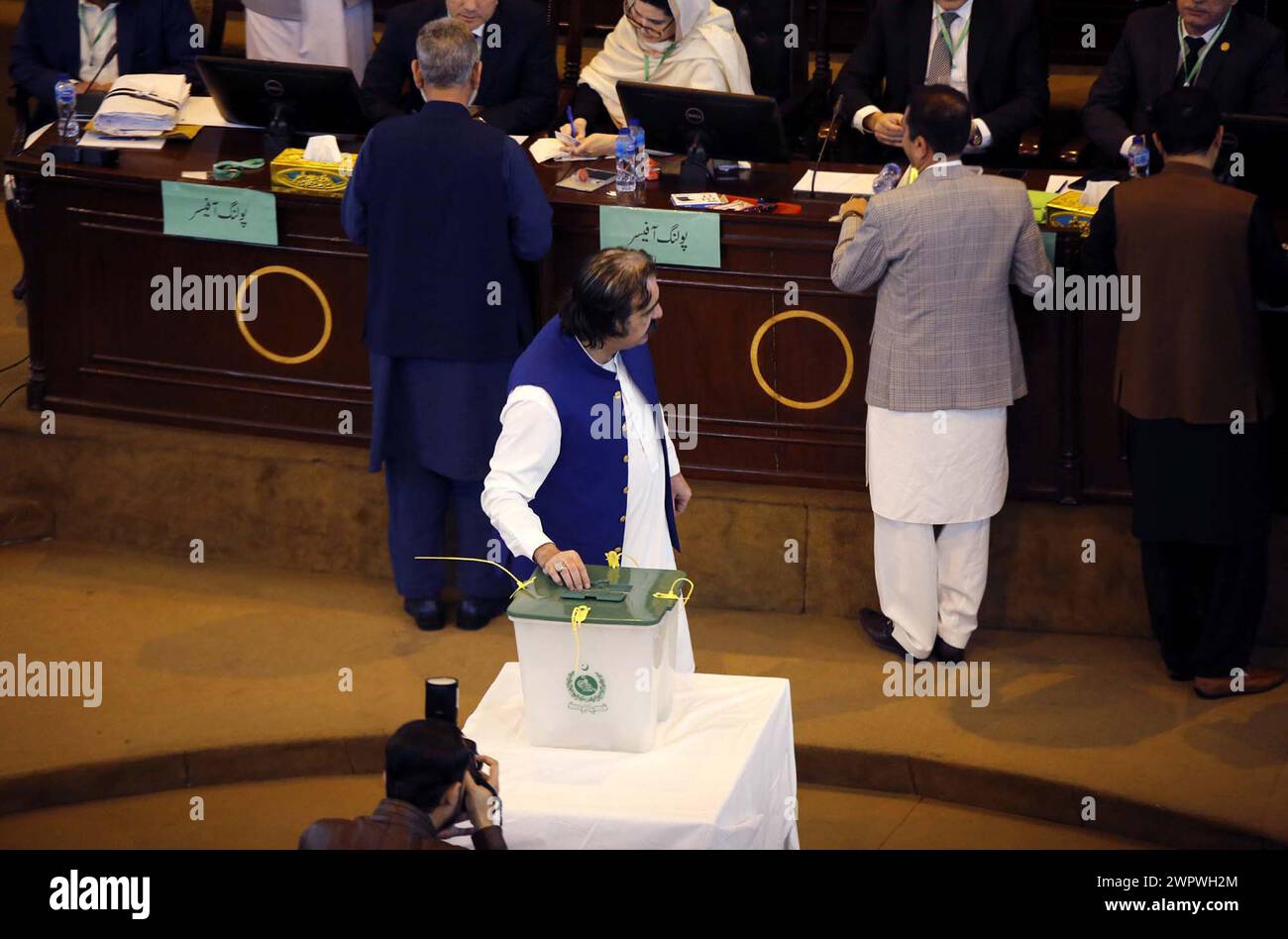 Chief Minister of Khyber Pakhtunkhwa, Ali Amin Gandapur casting his vote during provincial ...