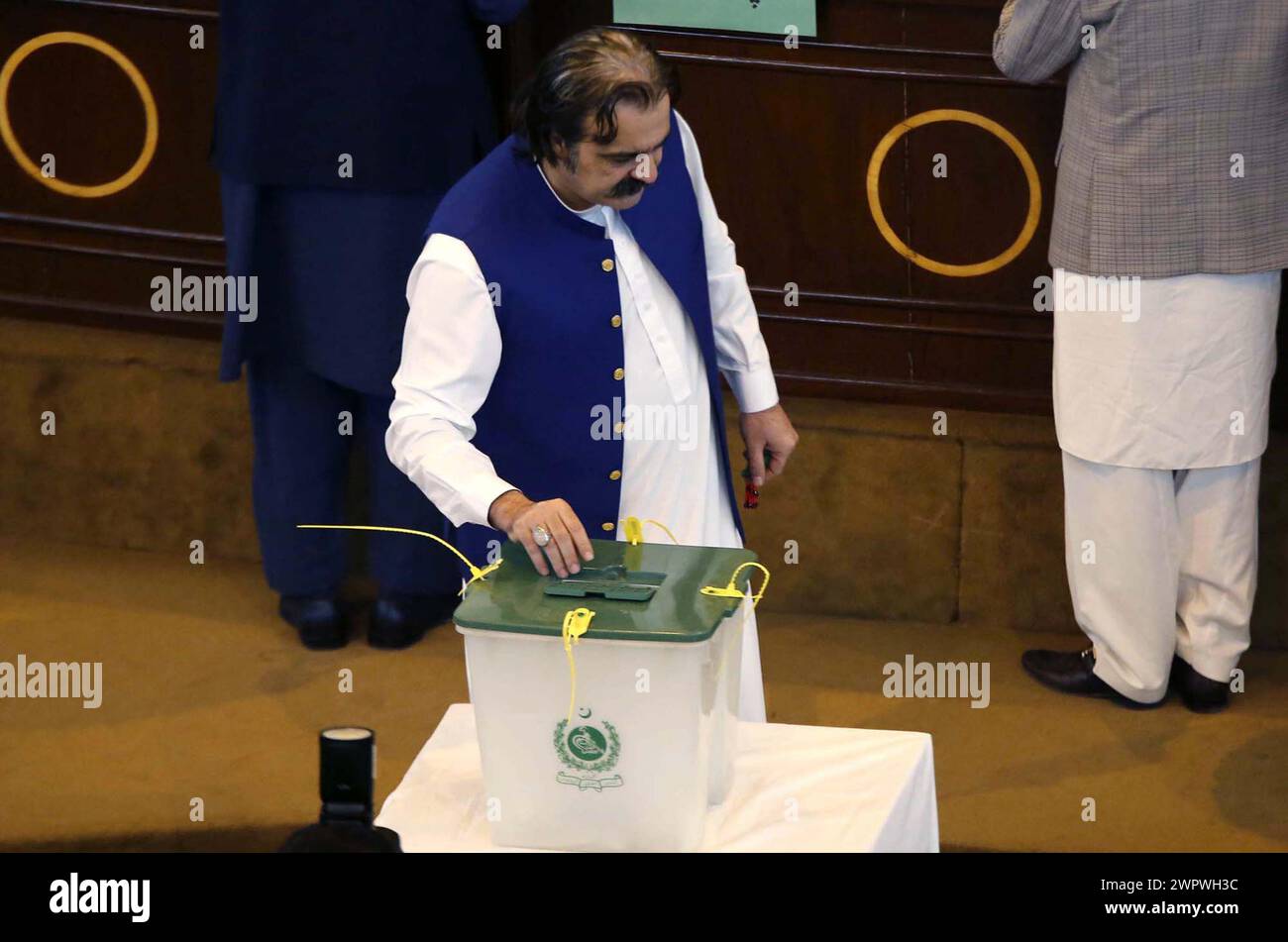Chief Minister of Khyber Pakhtunkhwa, Ali Amin Gandapur casting his vote during provincial ...