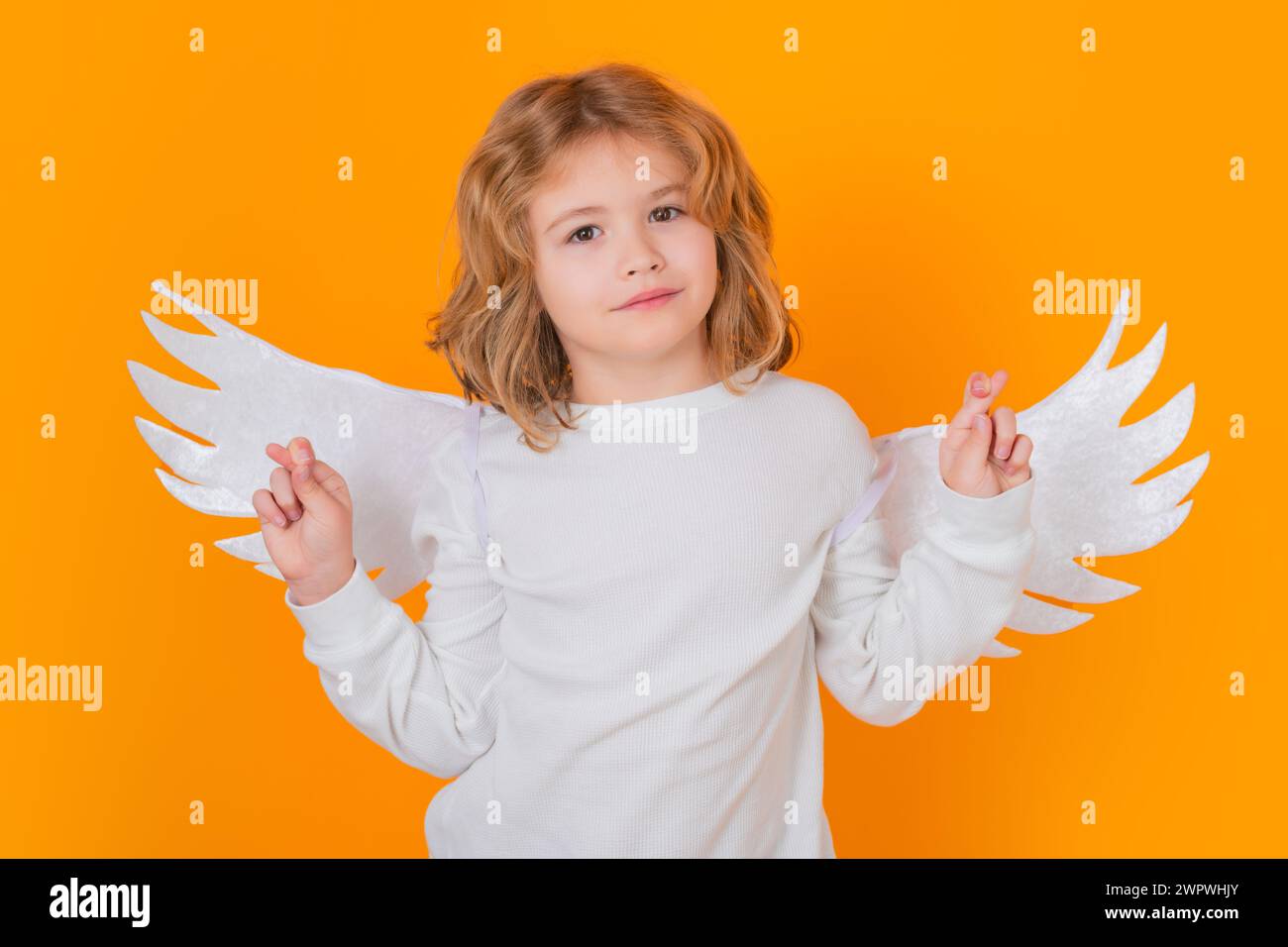 Child angel crossed fingers with lucky and hope, good luck. Valentine's ...