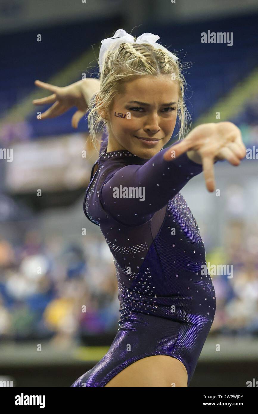 Baton Rouge, LA, USA. 8th Mar, 2024. LSU's Olivia Dunne competes on the ...
