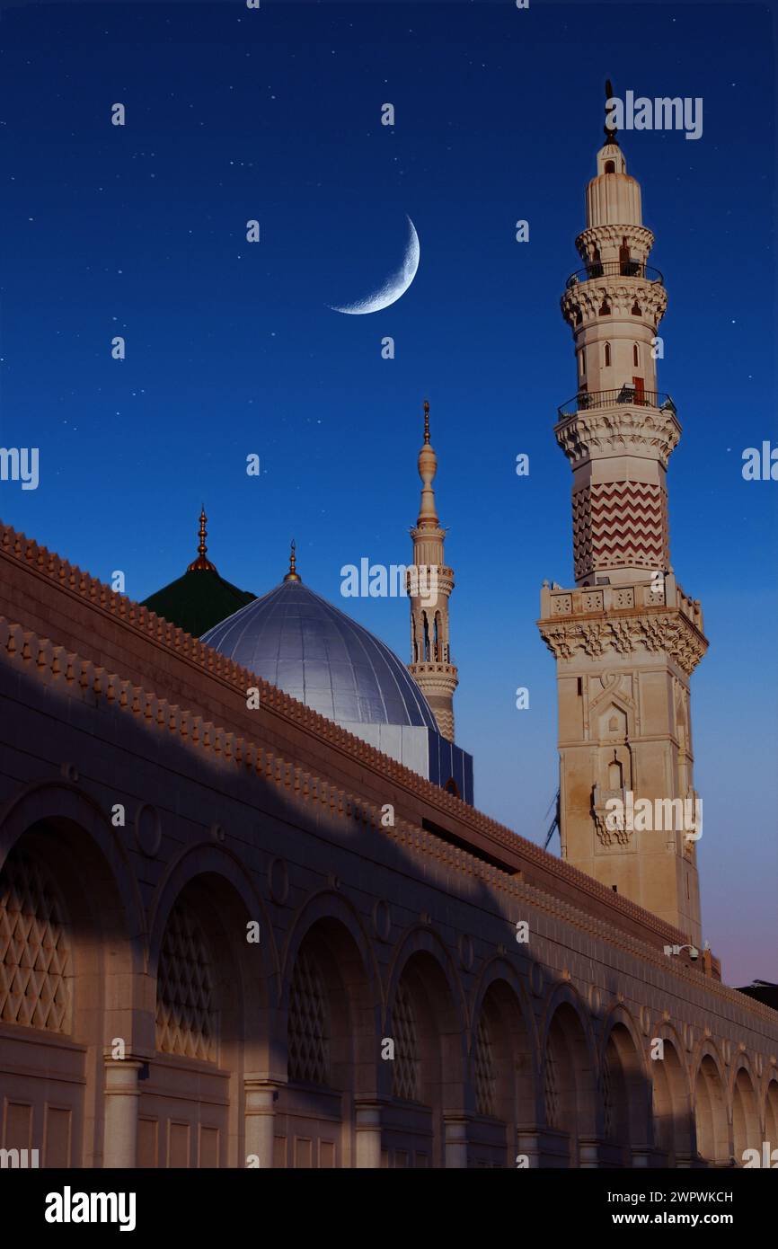 A mosque with the full moon in the sky. Masjid nabi of Medina, mosque ...