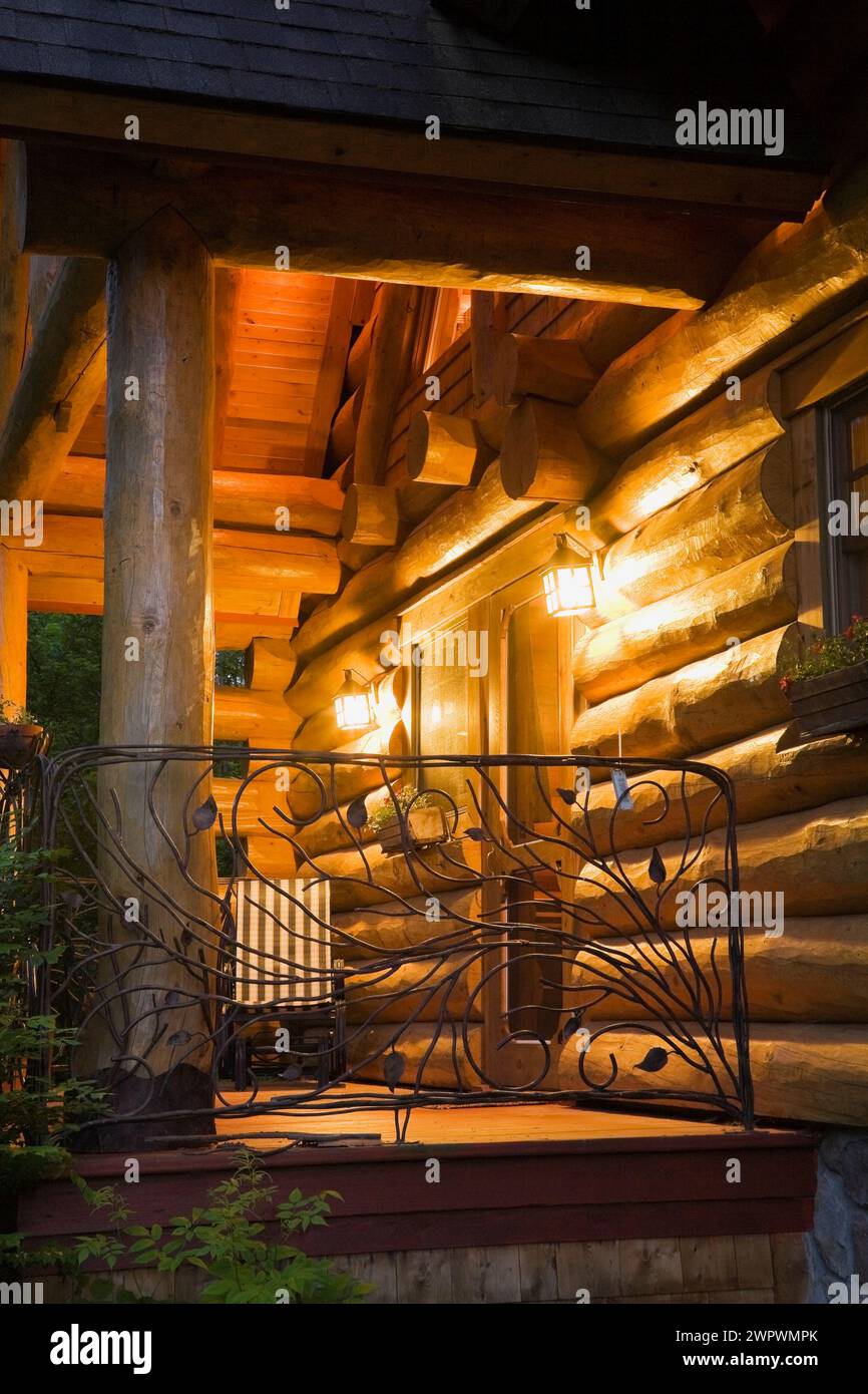 Front porch and entrance door on Scandinavian style built log cabin ...