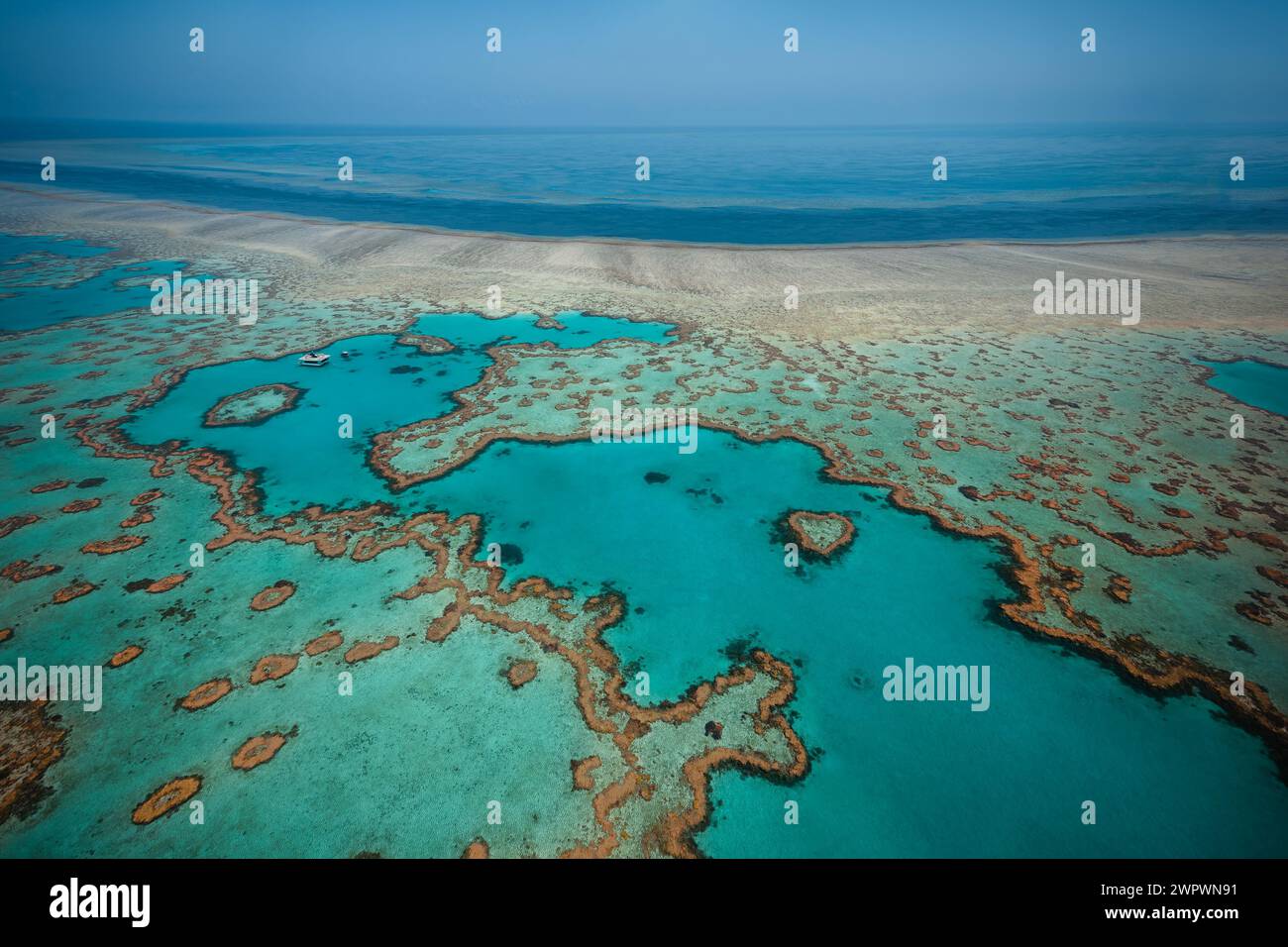 Aerial view of Great Barrier Reef coral reef structure in Whitsundays ...