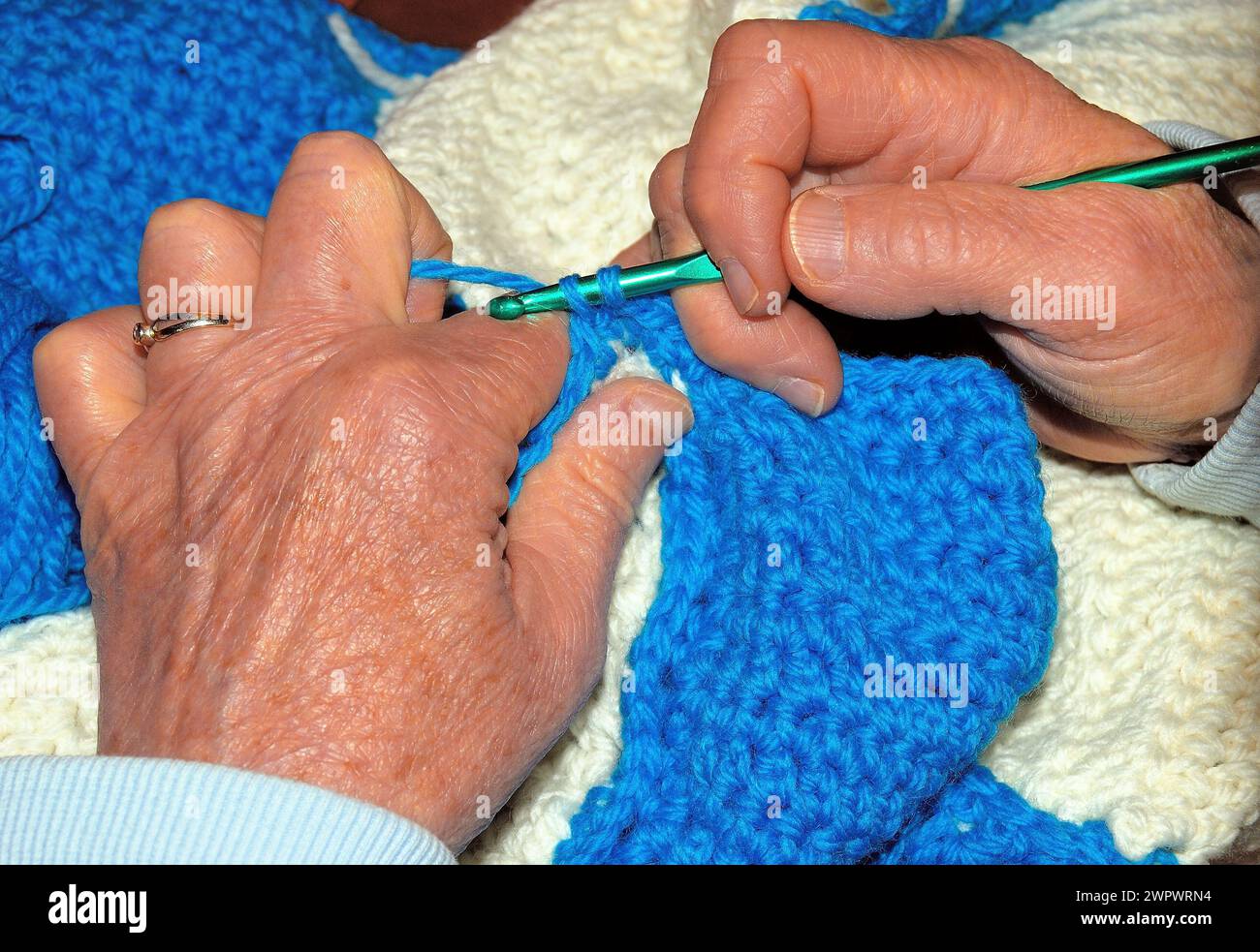 Woman crocheting. Close-up of hands crocheting Stock Photo - Alamy
