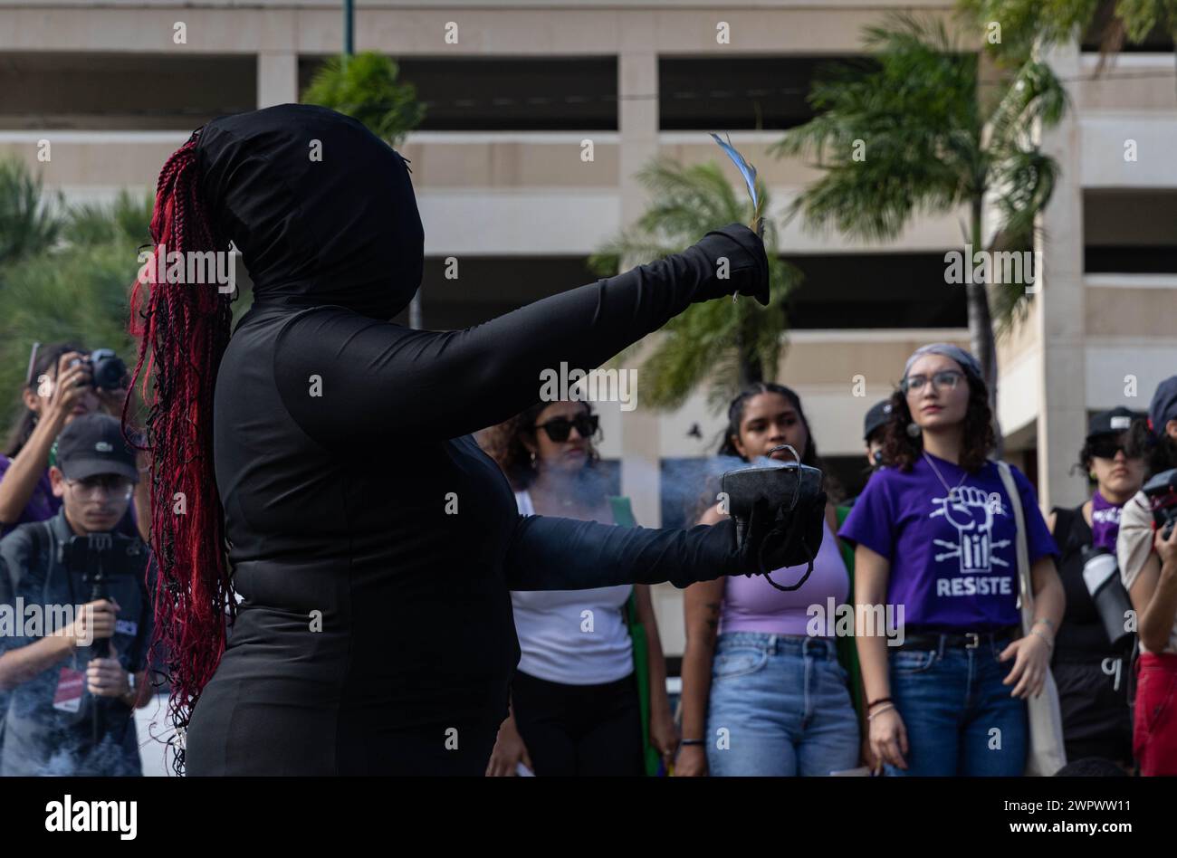 Feminist activists present a performance art piece meant to remember ...