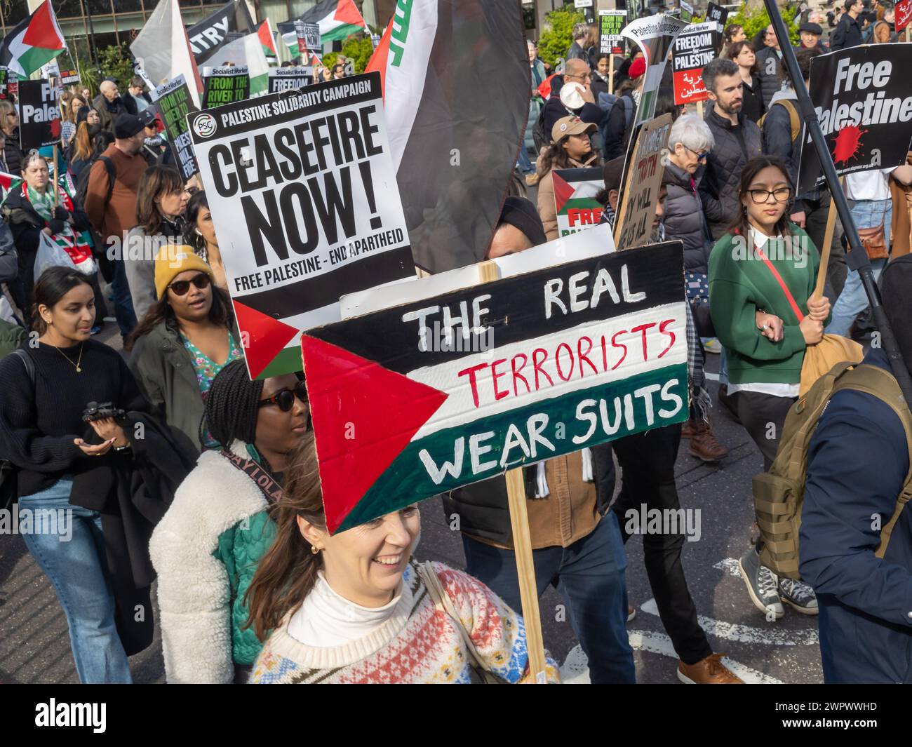 London, UK. 9 Mar 2024. 'The Real Terrorists Wear Suits.' A huge ...