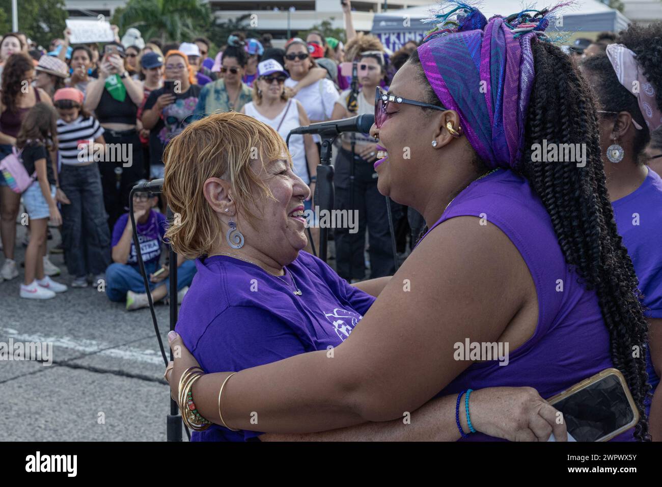 Two feminist activists embrace each other during a march to commemorate ...