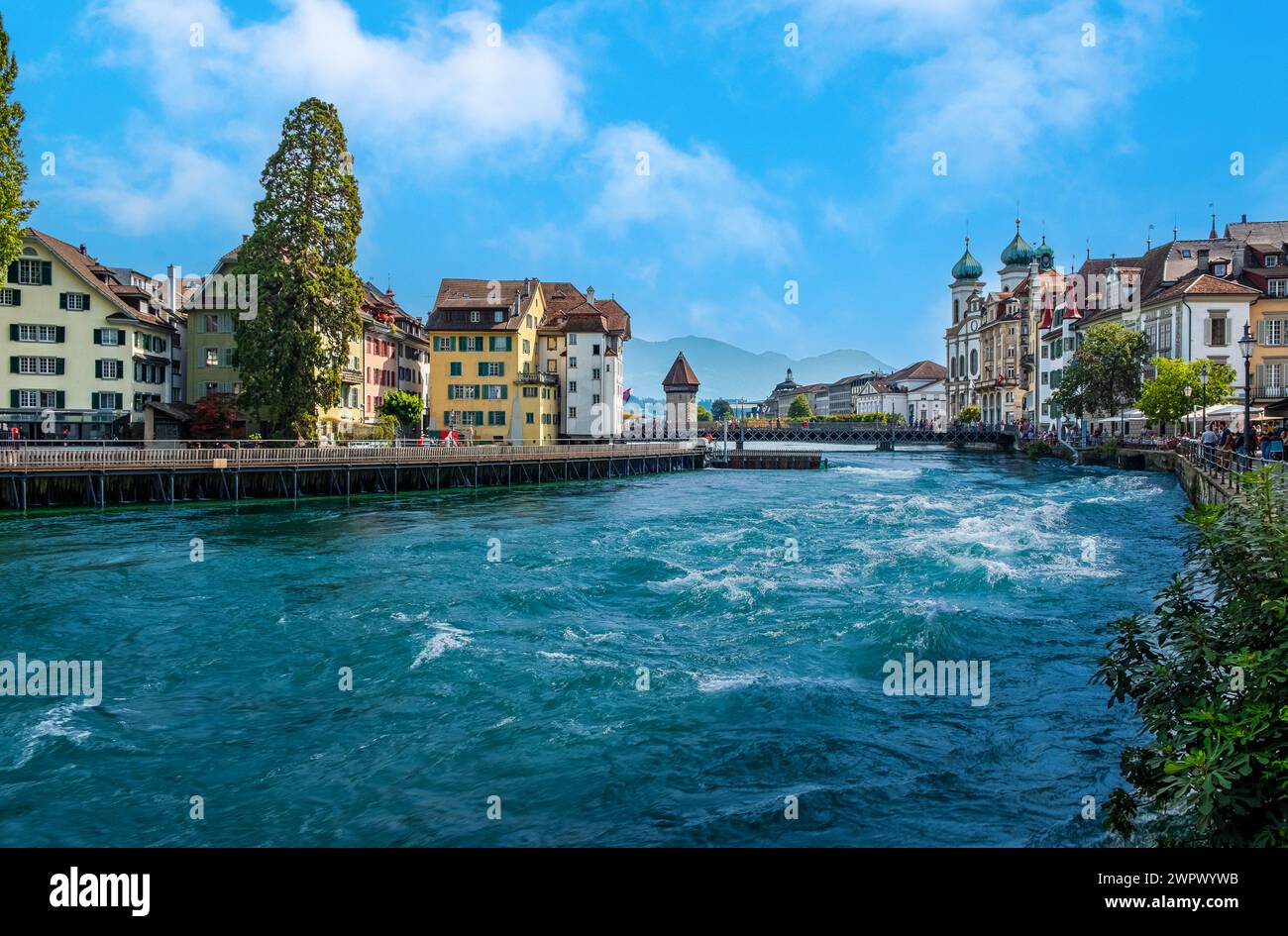The view west to Old Town Lucerne from a pedestrian bridge across Lake ...