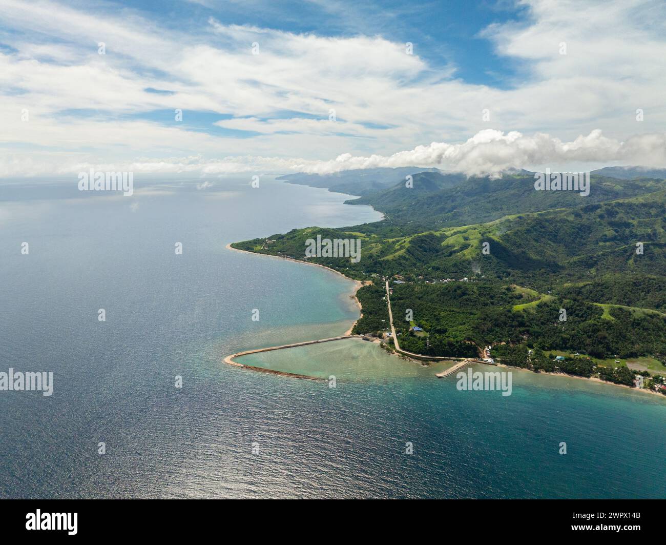 Aerial view of San Agustin with turquoise sea water and coral reefs ...