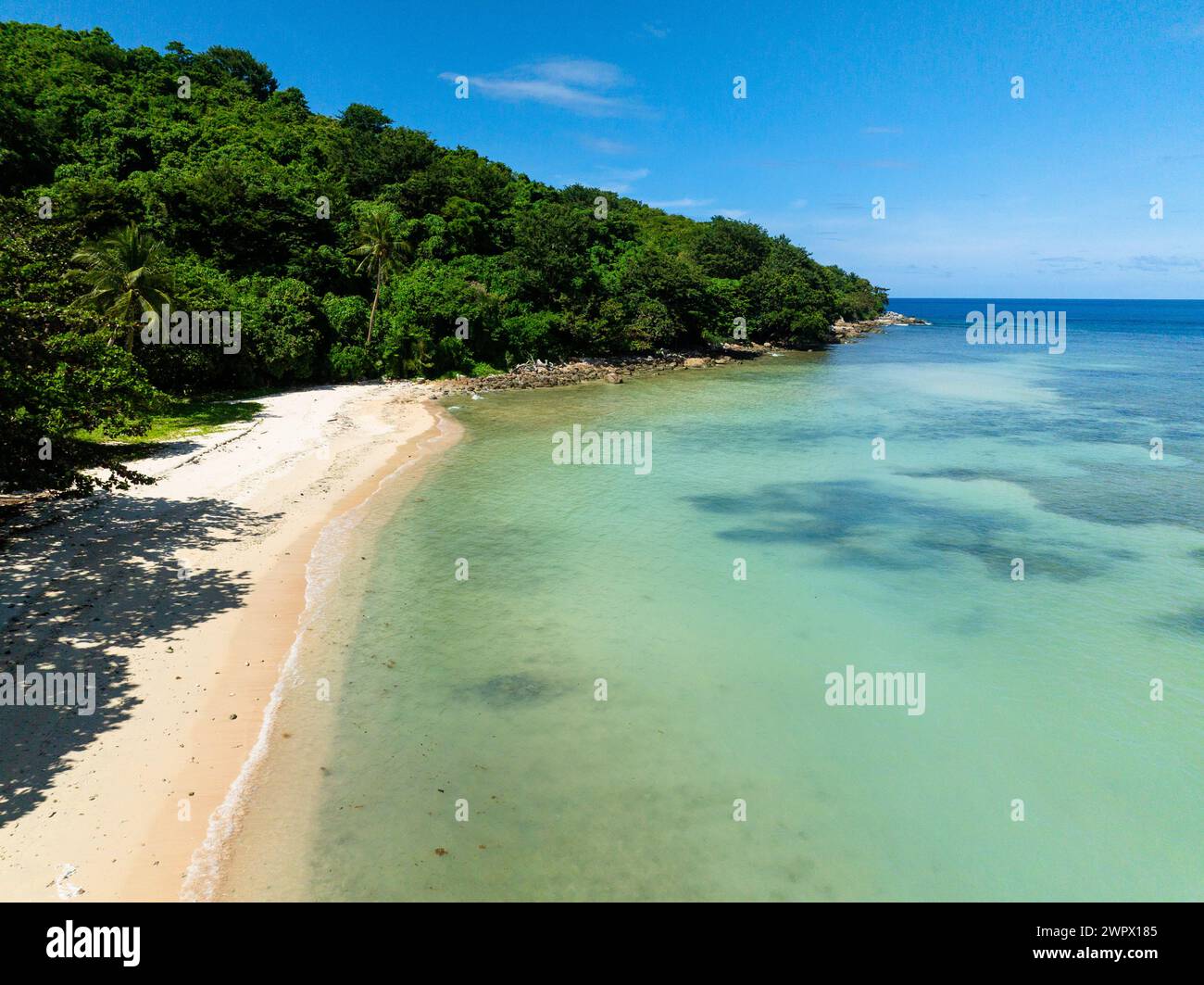 Tropical inshore waves on sandy beach in El Nido, Palawan. Philippines ...