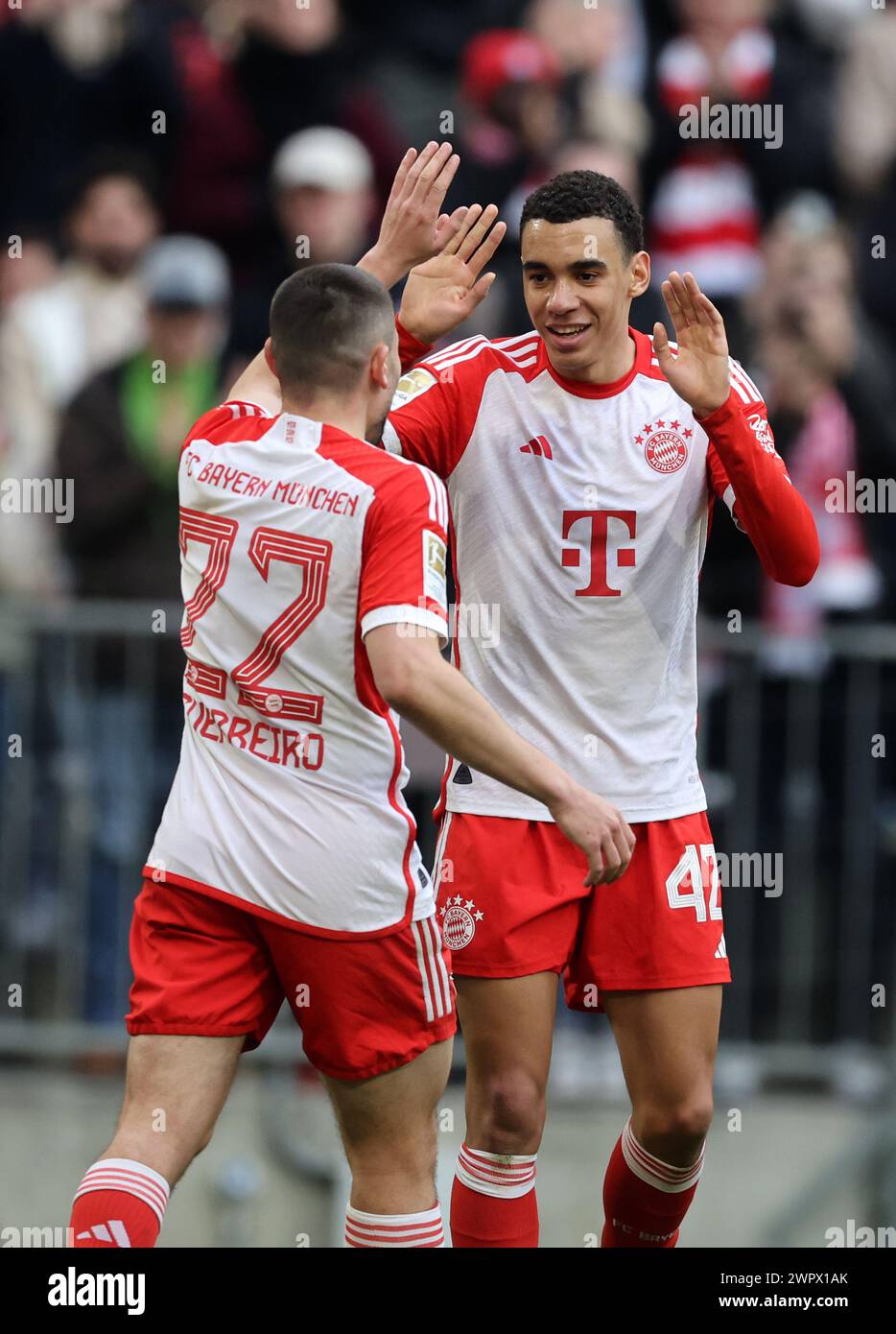 MUNICH, GERMANY - MARCH 09: Jamal Musiala of Bayern Muenchen celebrates ...