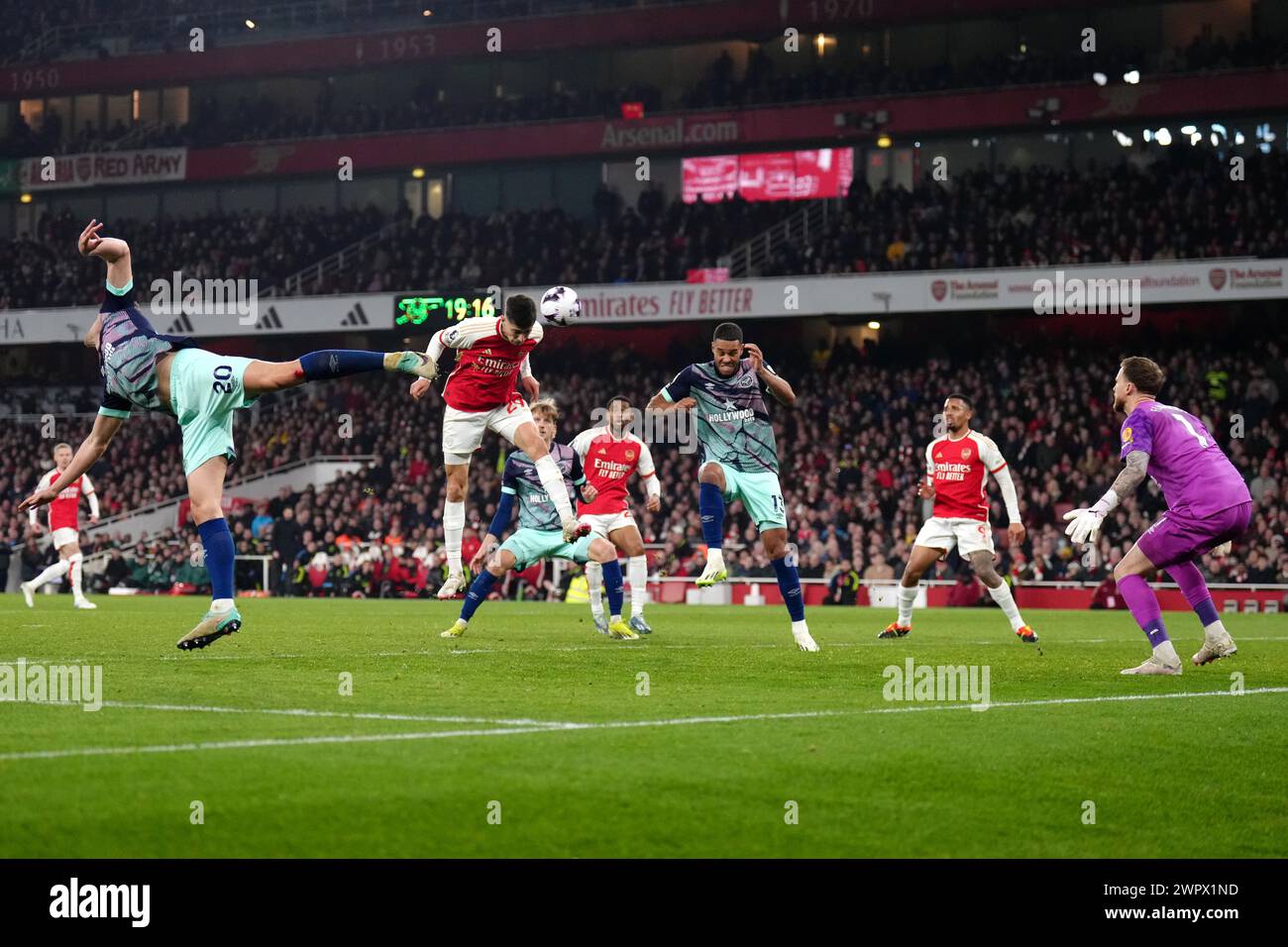 Arsenal's Kai Havertz (second left) scores their side's second goal of ...