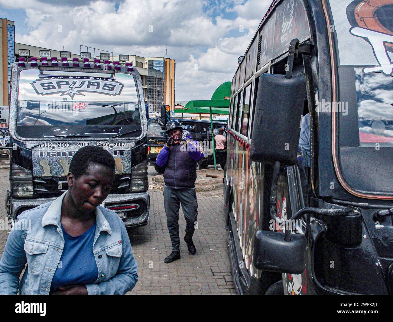 Nairobi, Nairobi, Kenya. 7th Mar, 2024. A man gestures as he walks ...
