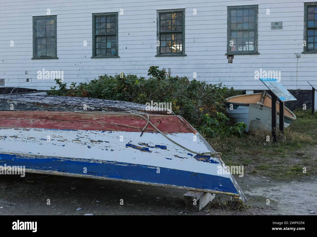 Numerous boats dot the beach and sand at Hull, Massachusetts. Hull is a ...