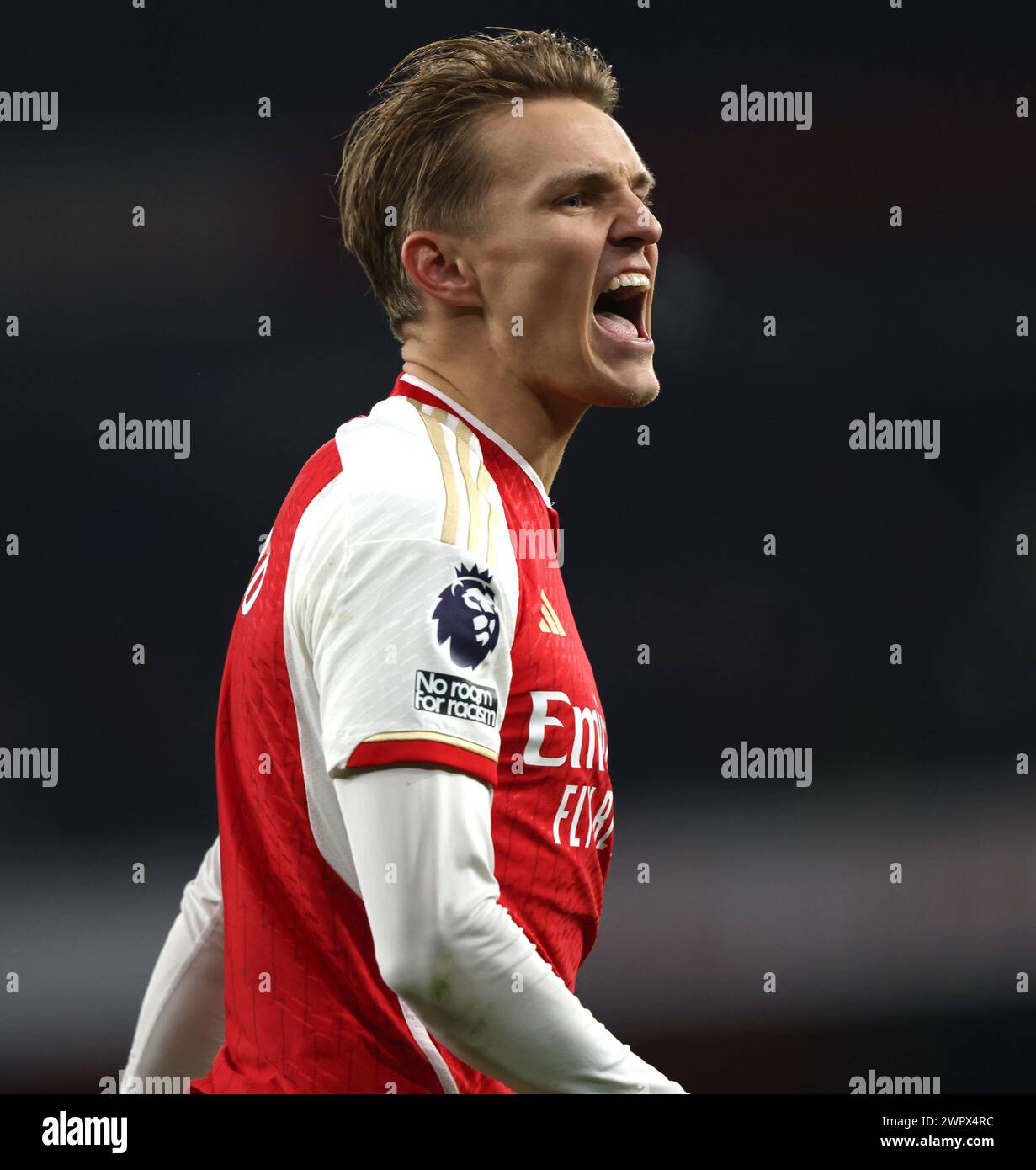 London, UK. 09th Mar, 2024. Martin Odegaard (A) celebrates victory at ...