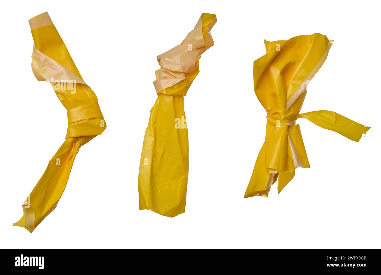 Knotted yellow polyethylene knots on isolated background, close up ...
