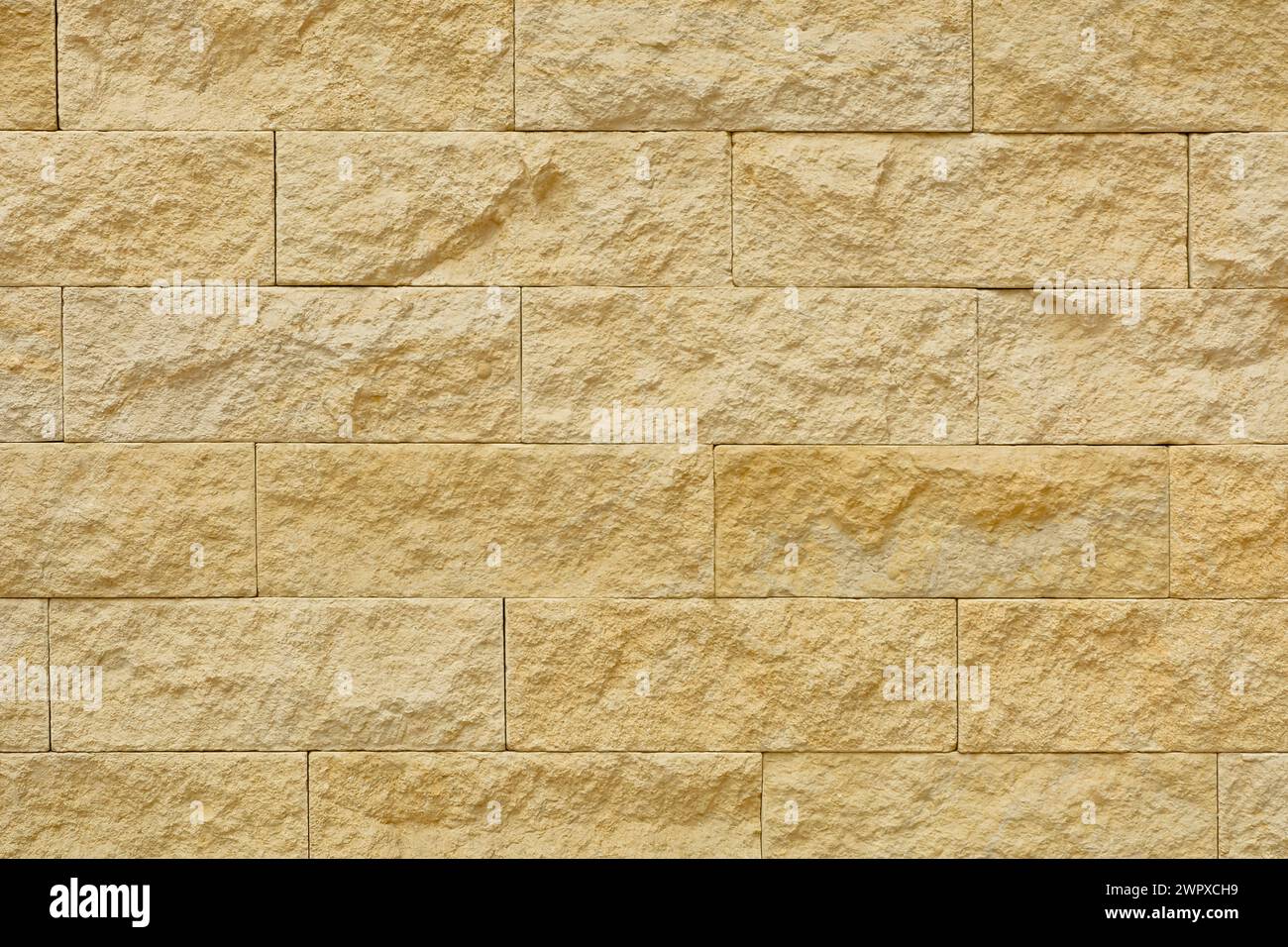 Beige stone blocks in the wall Stock Photo - Alamy