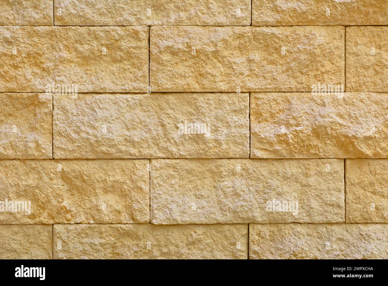 Beige stone blocks in the wall Stock Photo - Alamy