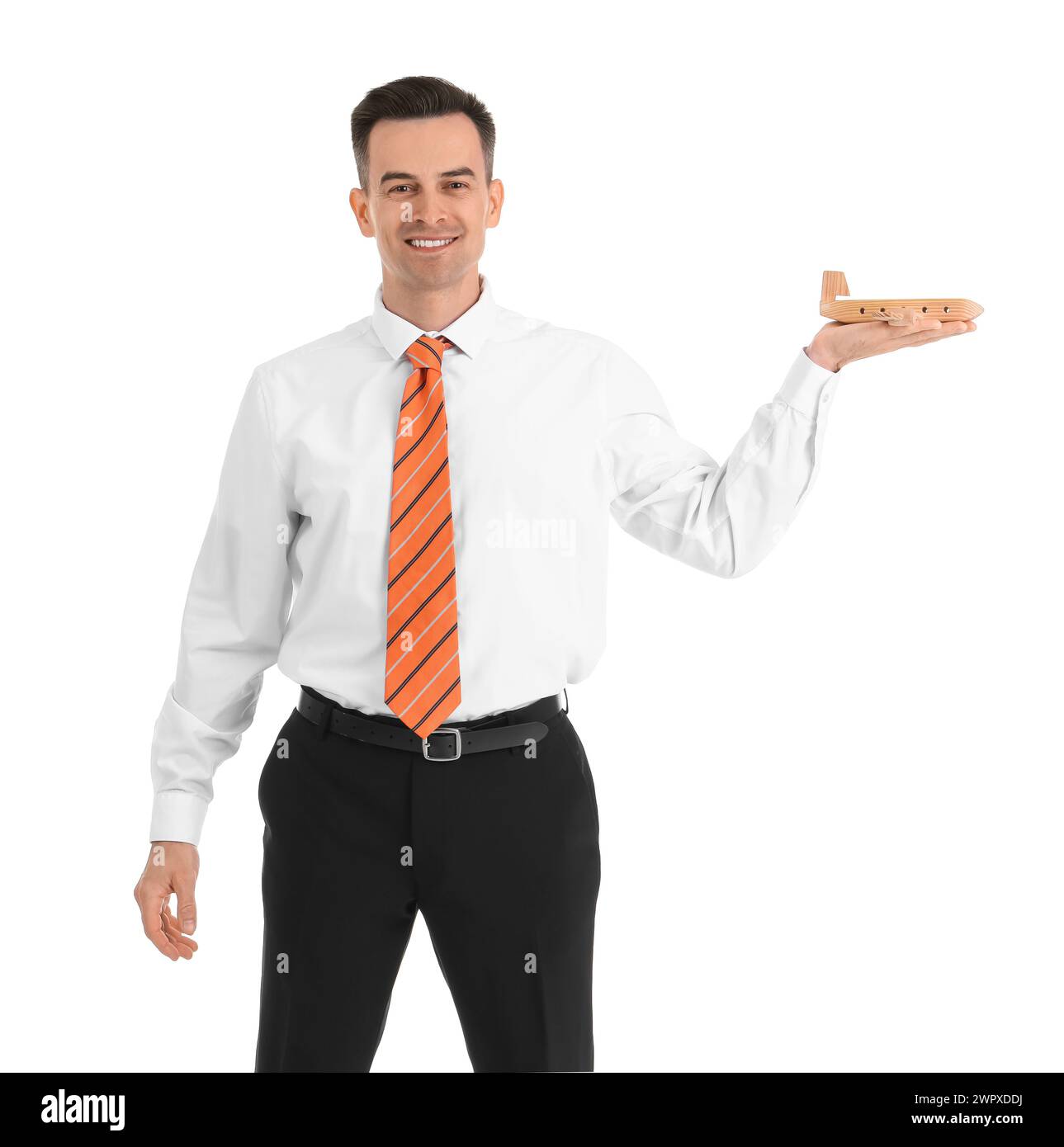 Handsome steward with wooden airplane on white background Stock Photo ...