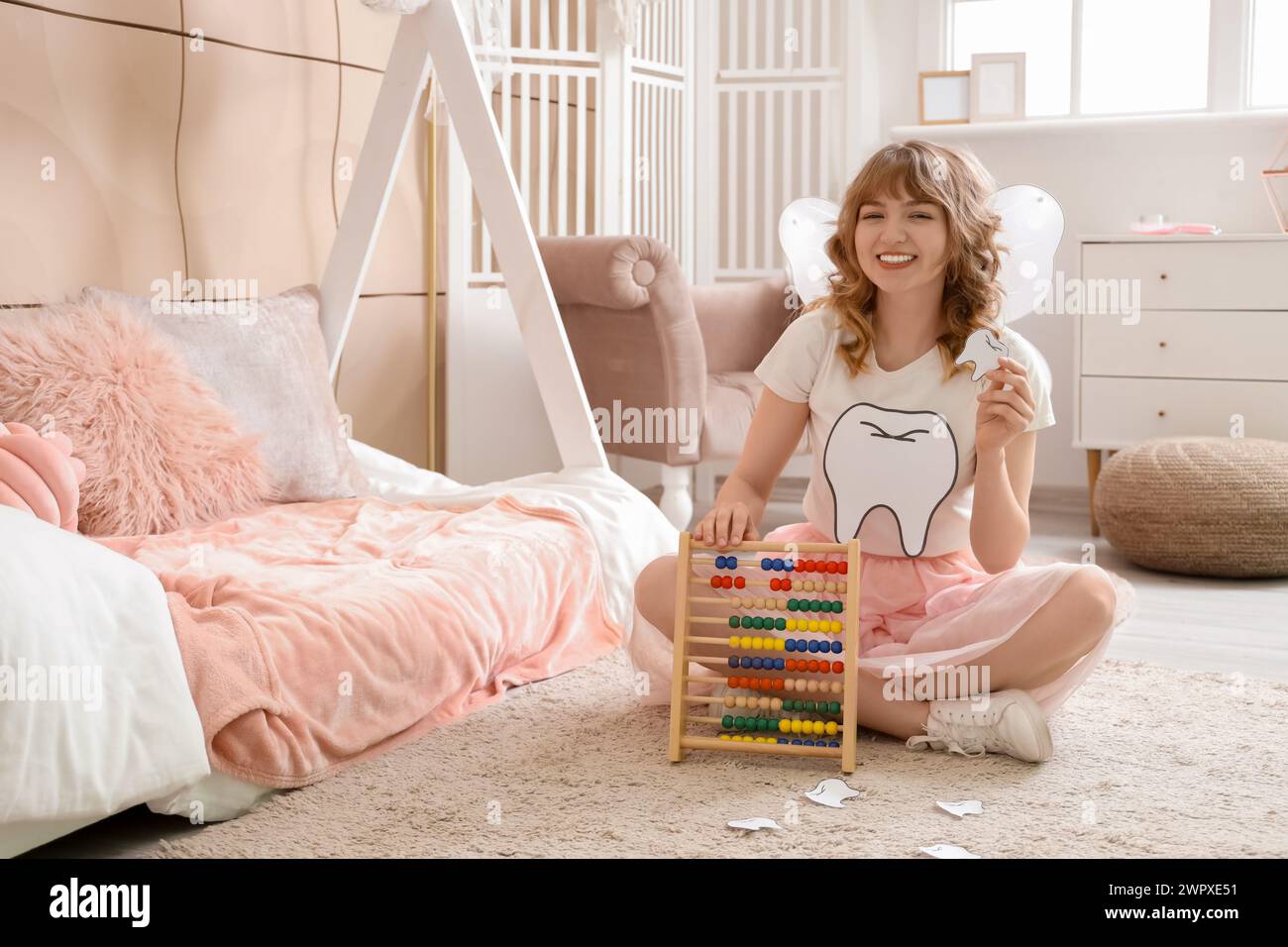 Tooth Fairy with abacus in children's bedroom Stock Photo - Alamy