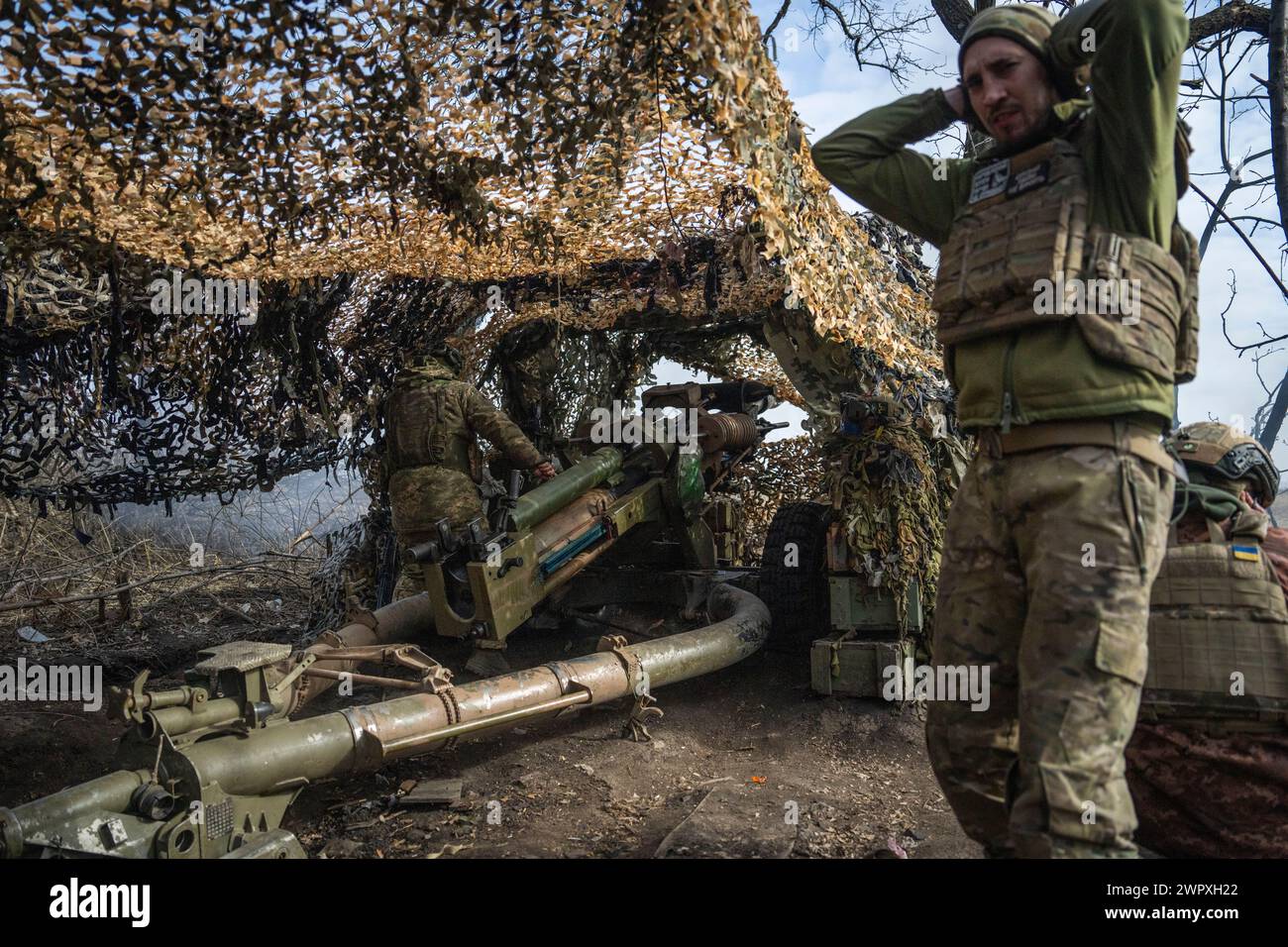Donbas, Ukraine. 09th Mar, 2024. A L119 Howitzer unit from Ukraine's ...