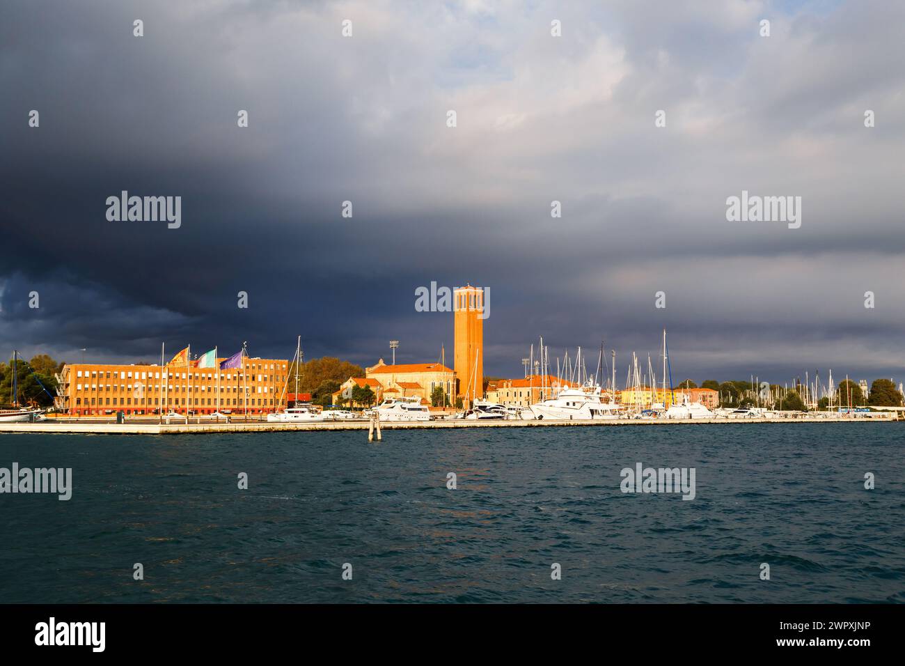 Bell tower of Sant'Elena Church and yacht harbor at extreme east end of ...