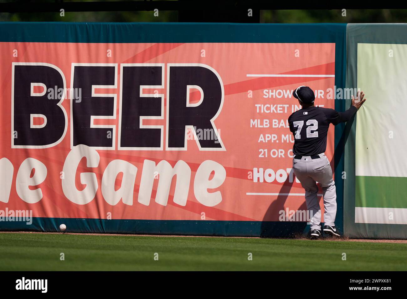 New York Yankees right fielder Oscar Gonzalez chases down a triple by ...