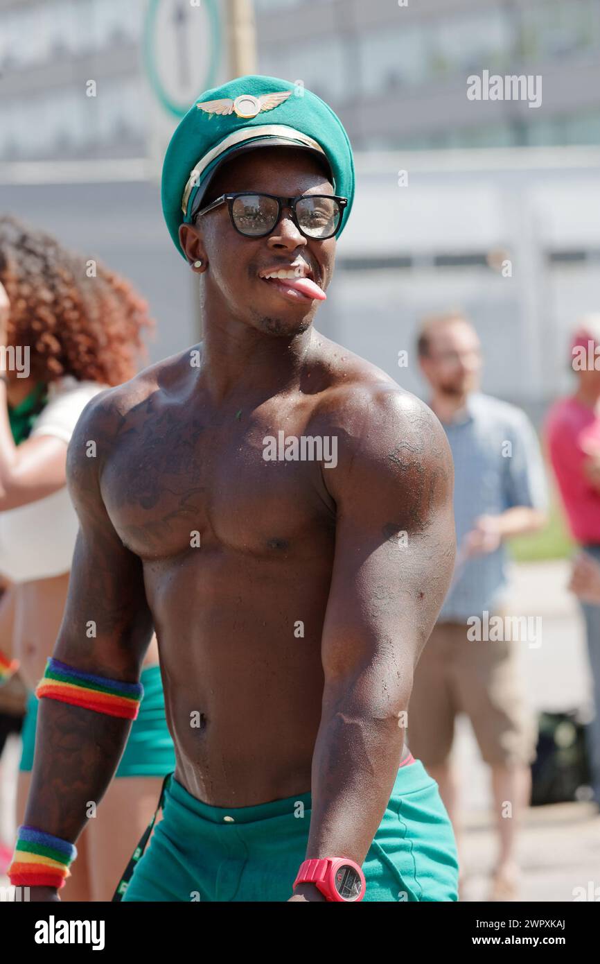 A young muscular male participates in the Montreal Pride Parade Stock ...
