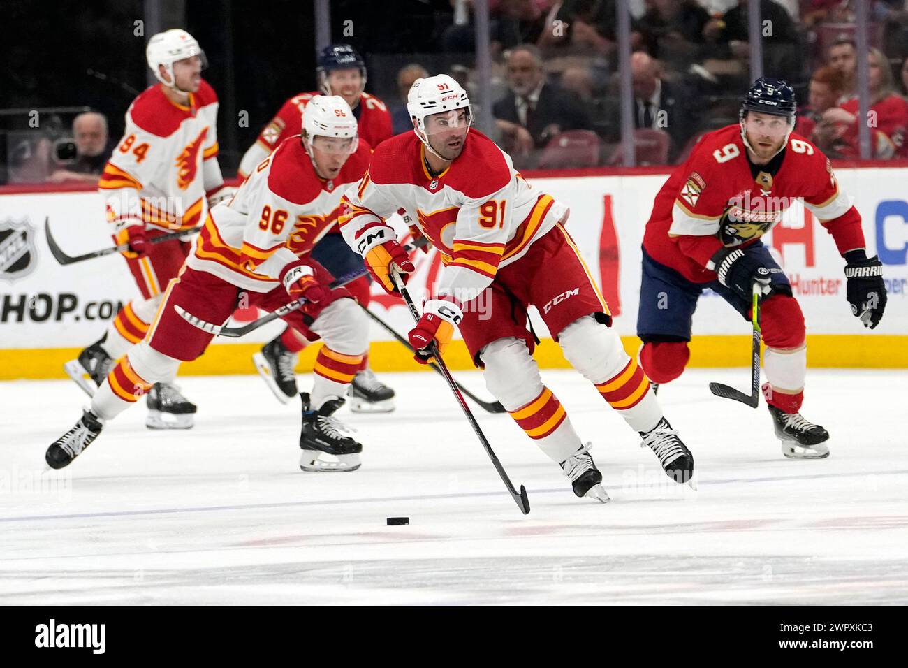 Calgary Flames center Nazem Kadri (91) skates with the puck as Florida ...