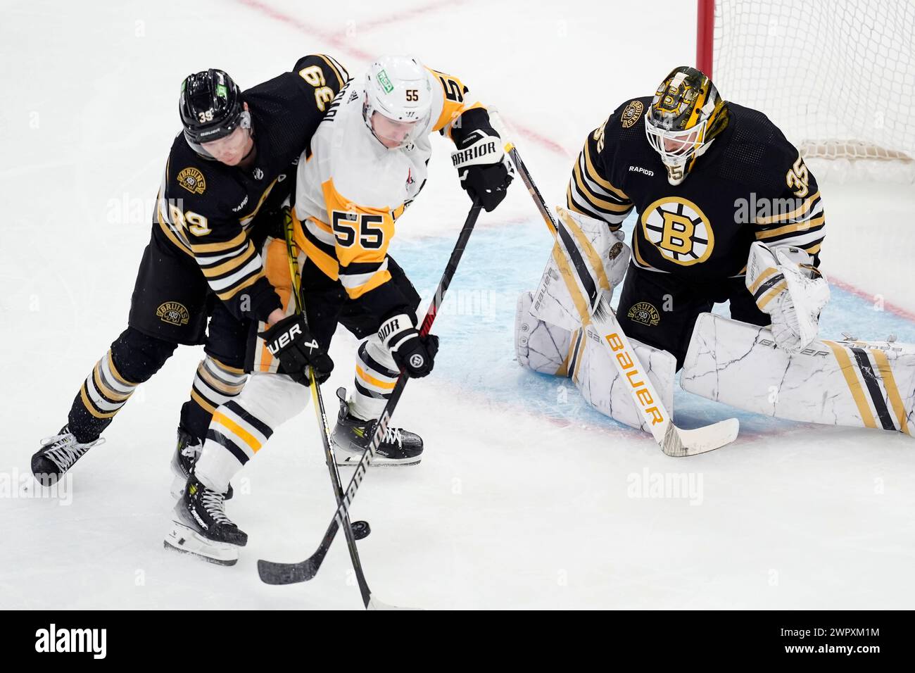 Boston Bruins' Morgan Geekie (39) and Pittsburgh Penguins' Noel Acciari ...