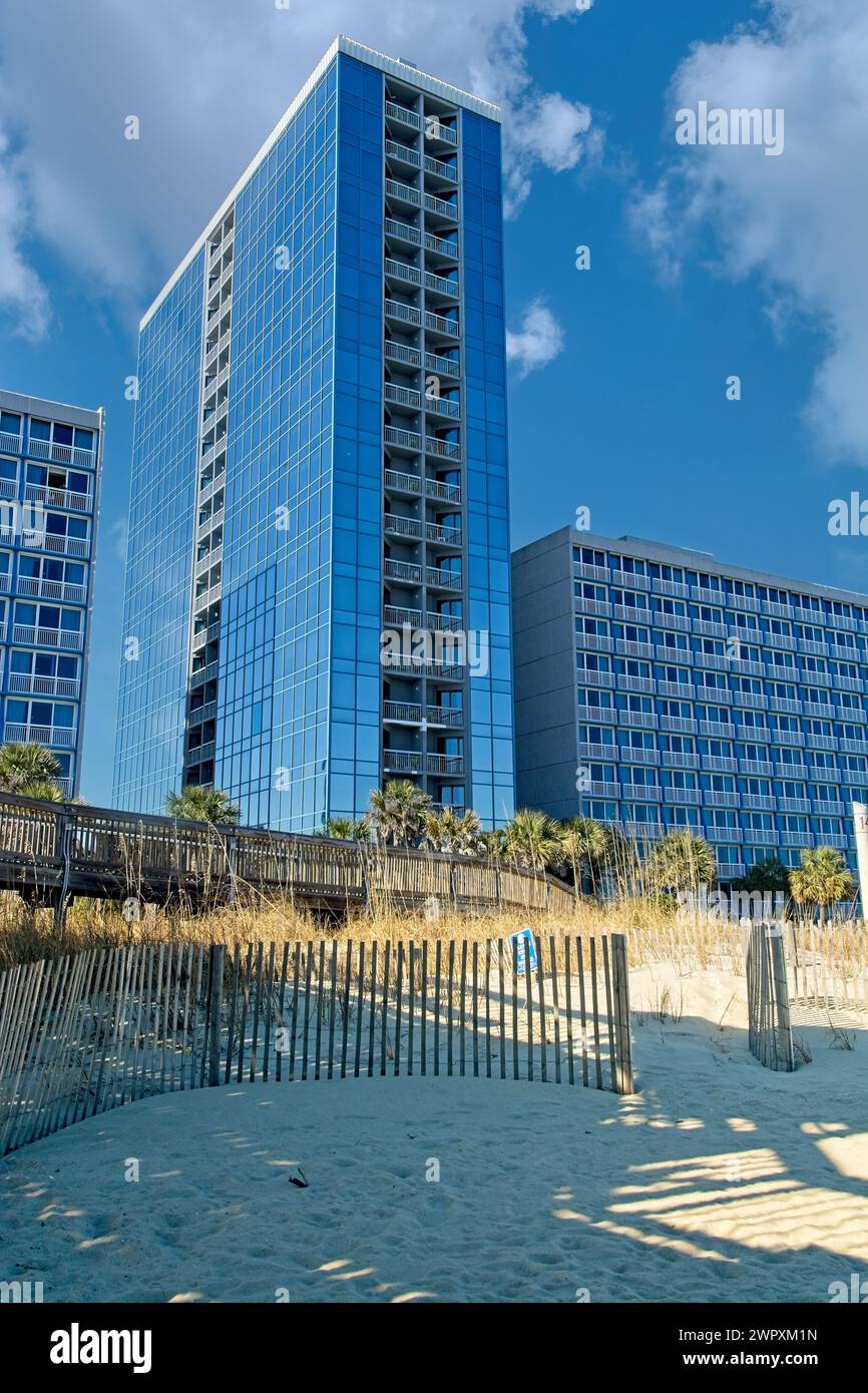Residential towers overlooking beach at boardwalk of Myrtle Beach Stock ...