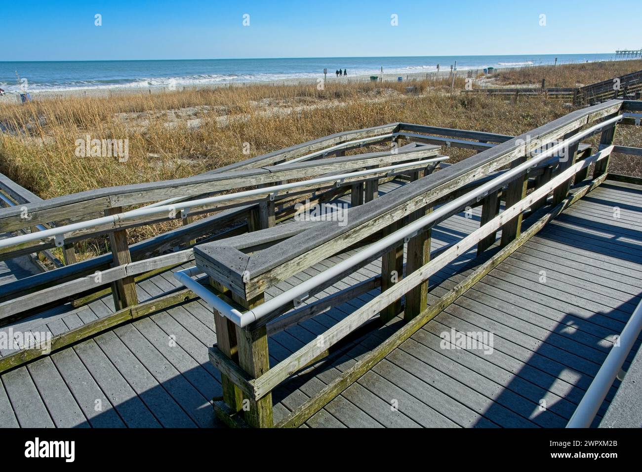 Handicap accessible boardwalk switchback towards ocean beach at Myrtle ...