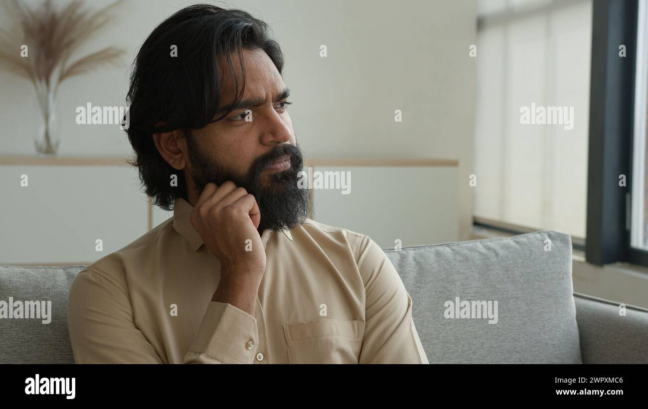 Thoughtful man Arabian muslim guy think idea indian male homeowner ...