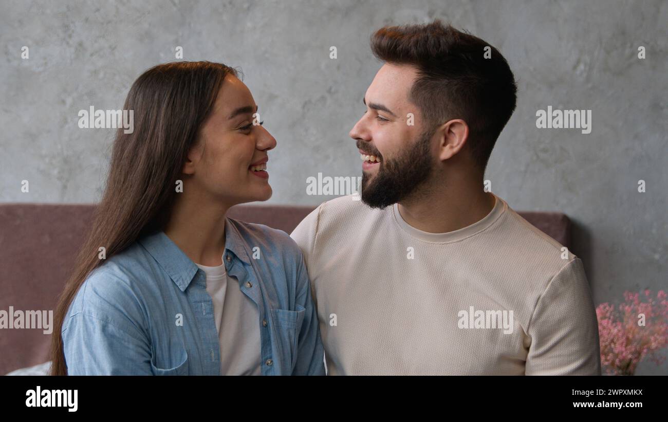 Caucasian married happy family in love at home bedroom smiling couple ...