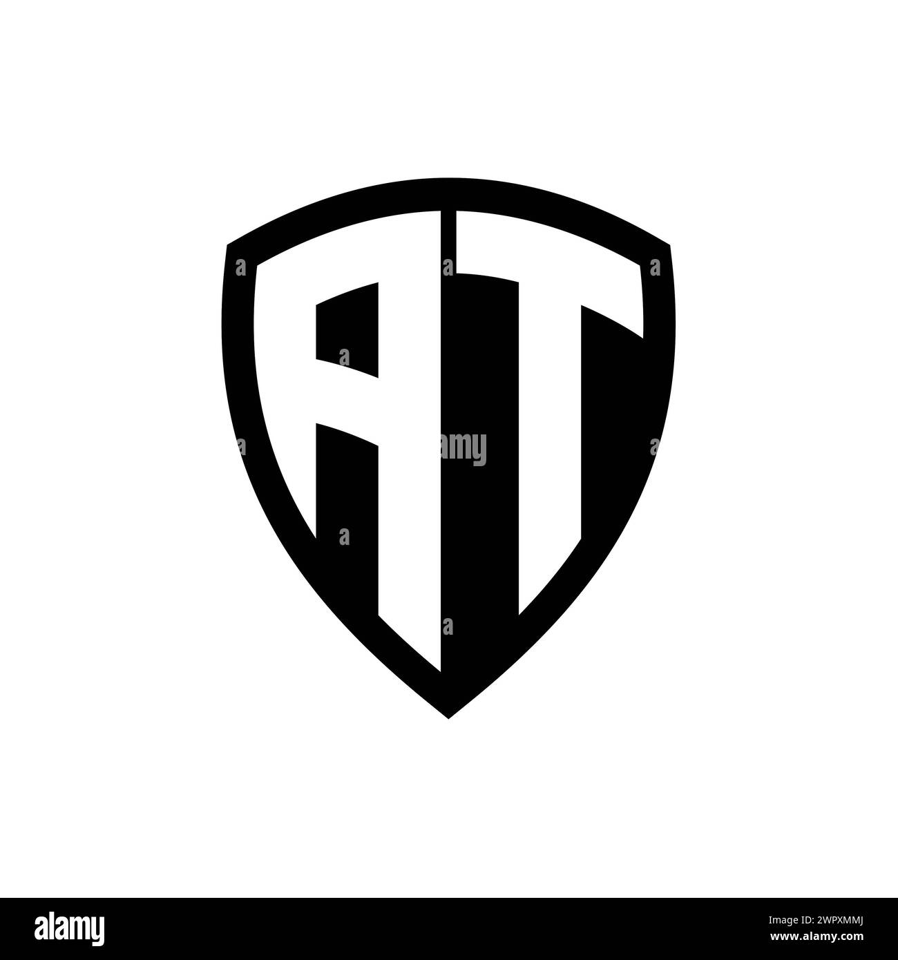 AT monogram logo with bold letters shield shape with black and white ...