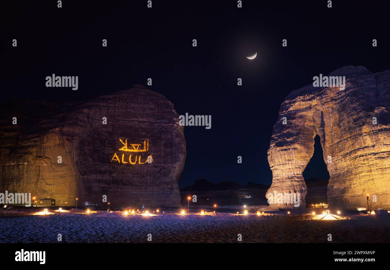 Jabal AlFil - Elephant Rock in evening, landscape illuminated, text ...