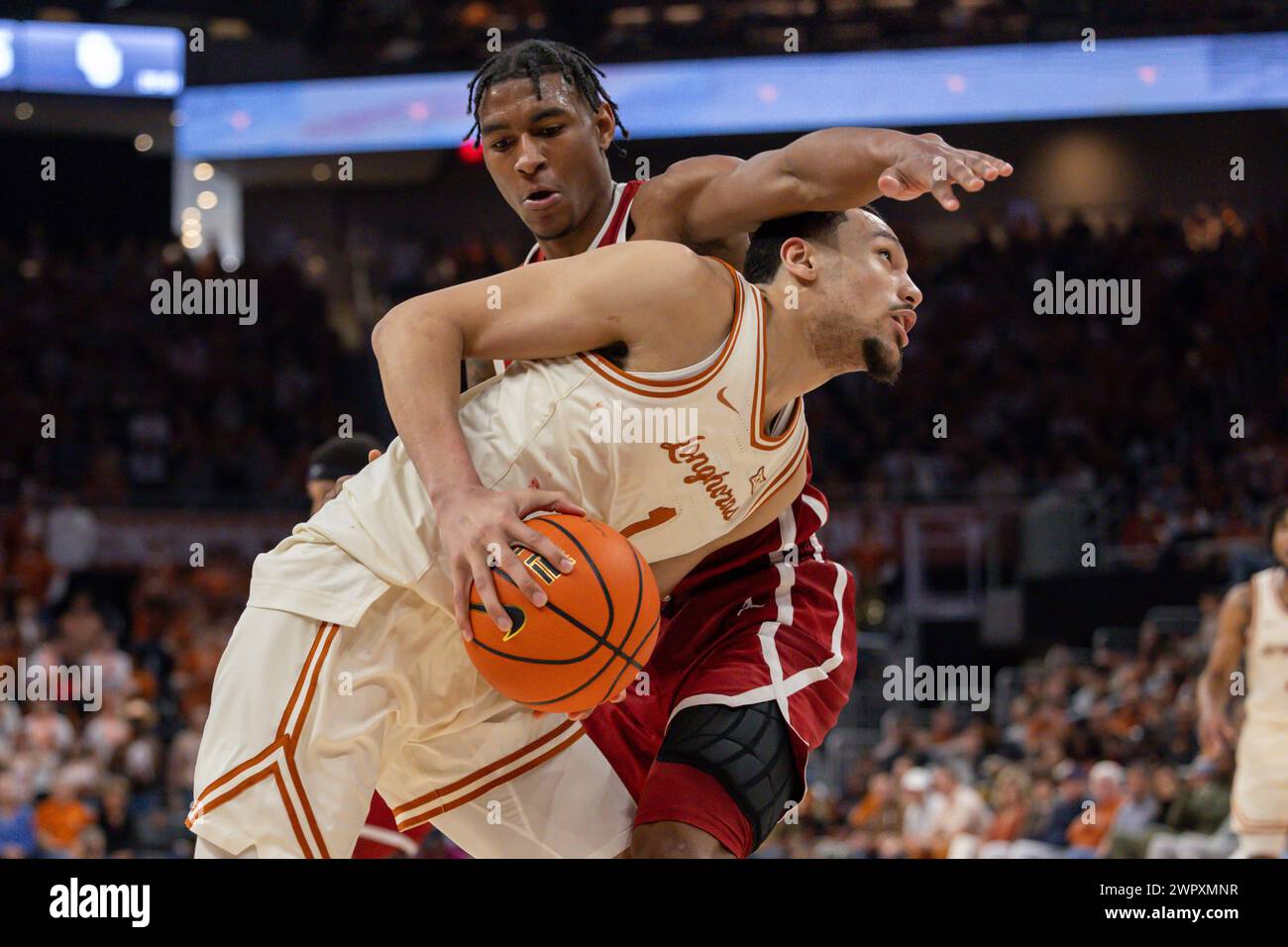AUSTIN, TX - MARCH 09: Texas Longhorns forward Dylan Disu (1) pushes ...
