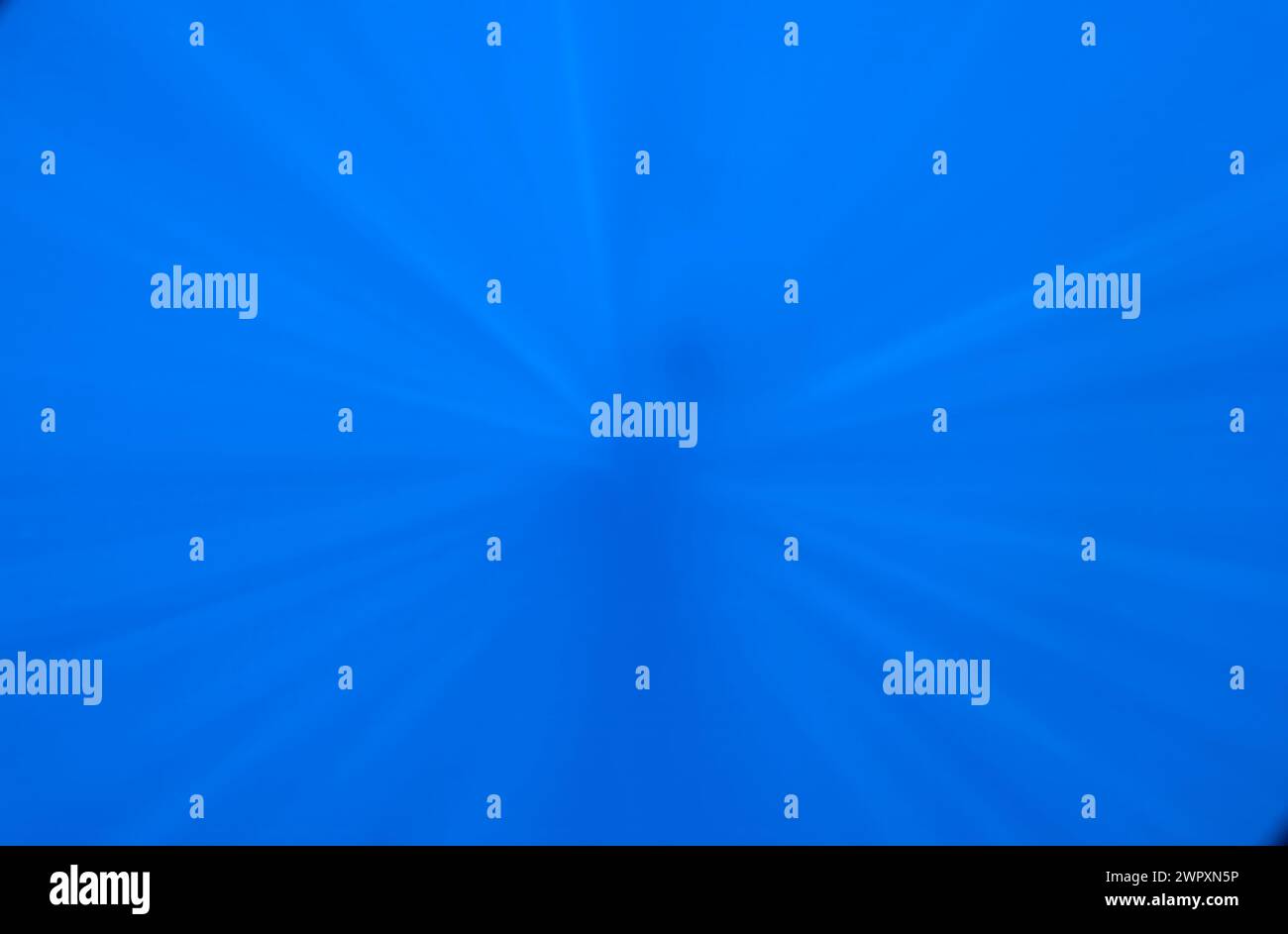 Sunlight beaming down through the clear blue water of the Caribbean Sea ...