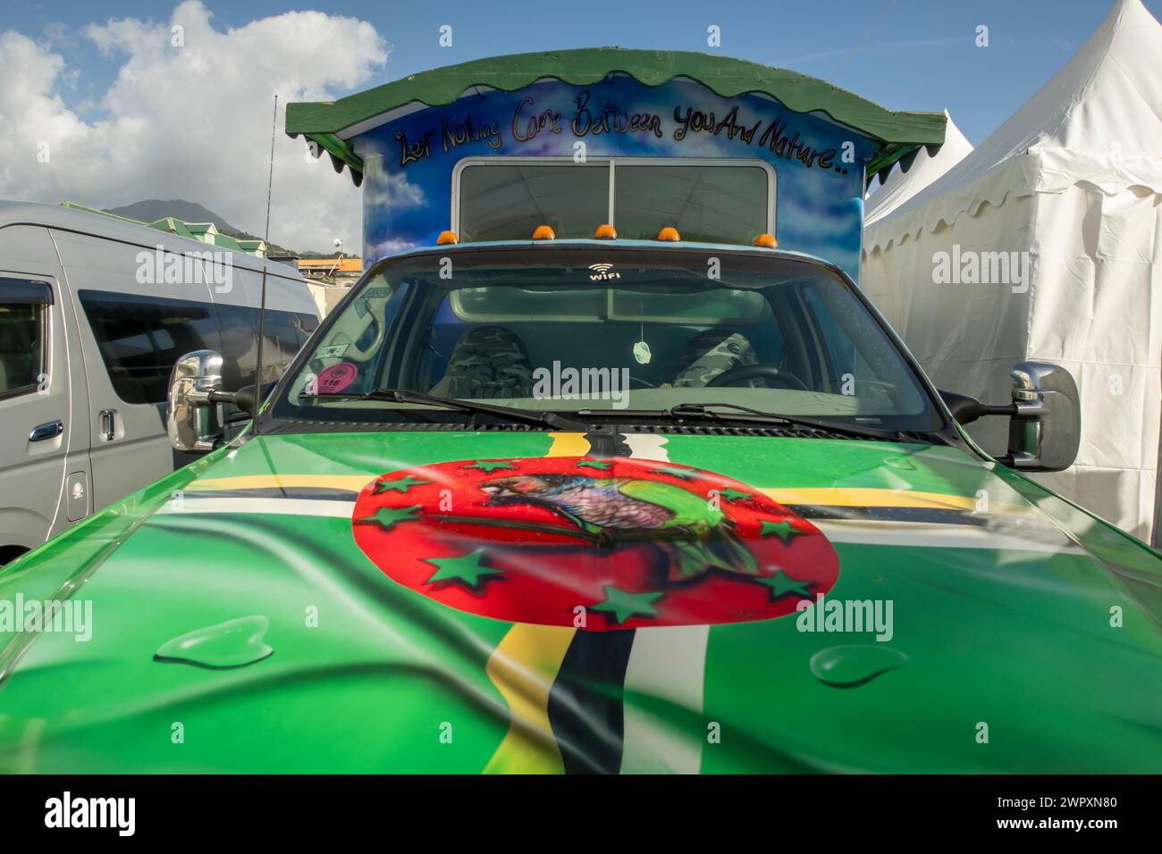 A small truck displaying the national flag in Roseau, Dominica Stock ...