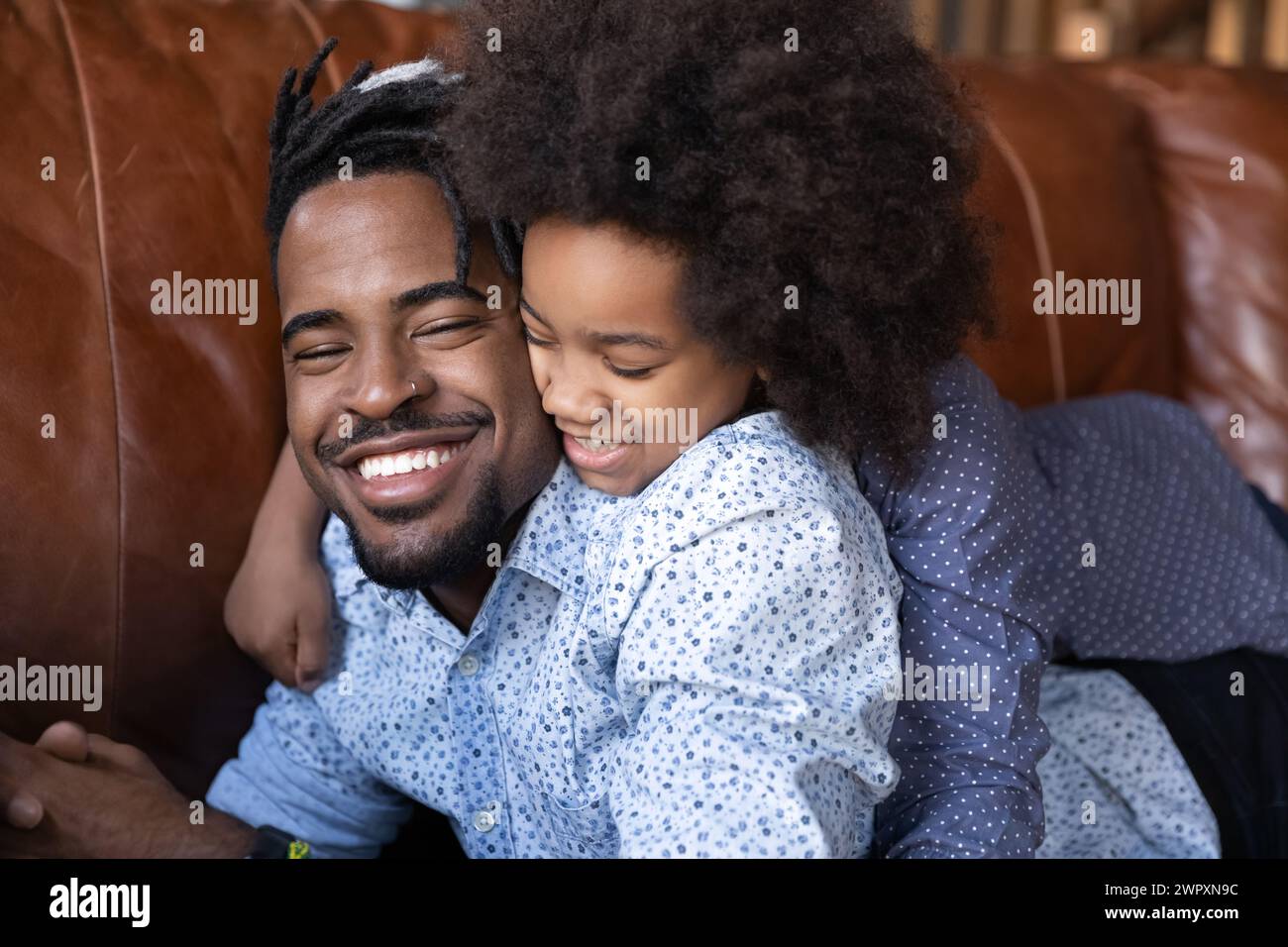 Closeup happy faces of African loving dad and cute daughter Stock Photo ...