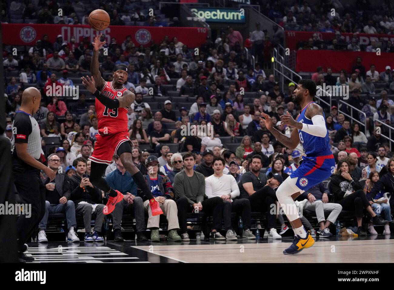 Chicago Bulls forward Torrey Craig, second from left, saves the ball ...