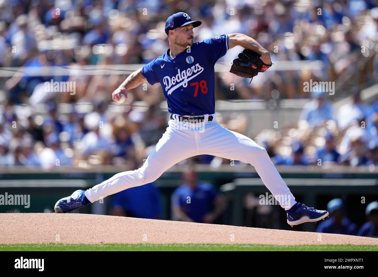Los Angeles Dodgers starting pitcher Michael Grove throws in the first ...