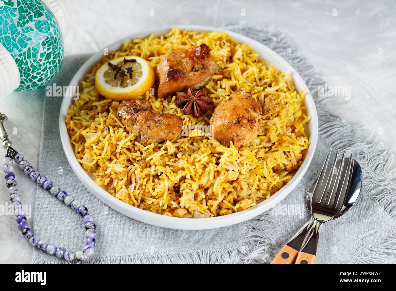 Pakistani and Indian Chicken Biryani Rice with Spices on White Plate ...