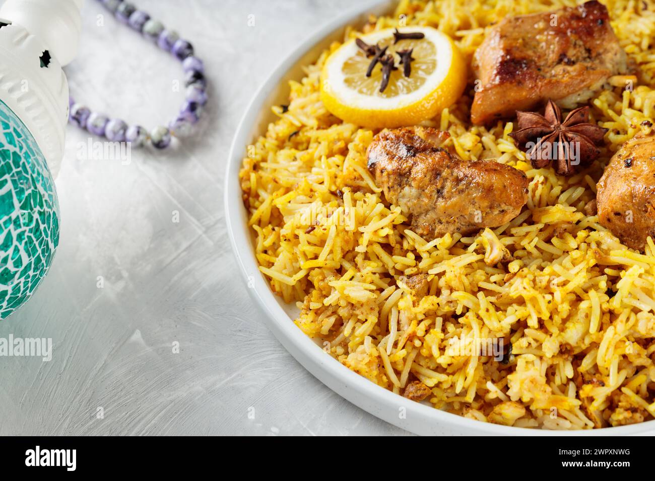 Pakistani and Indian Chicken Biryani Rice with Spices on White Plate ...