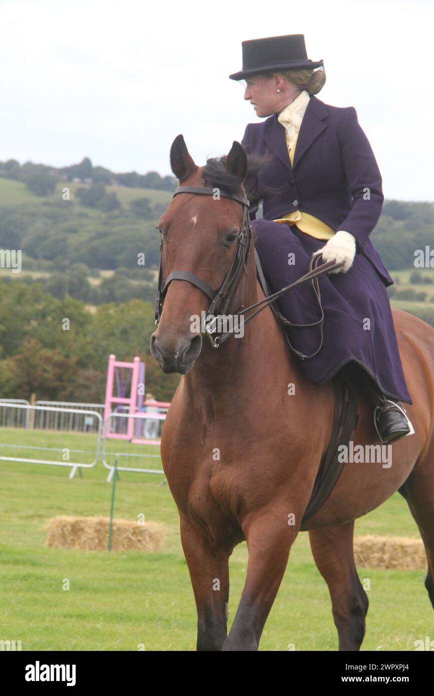 A WOMAN RIDING A HORSE SIDE SADDLE Stock Photo - Alamy