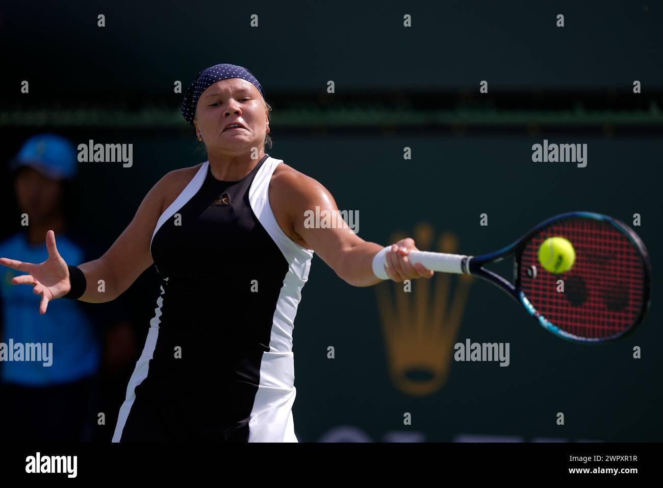 Diana Shnaider, of Russia, returns to Maria Sakkari, of Greece, at the ...