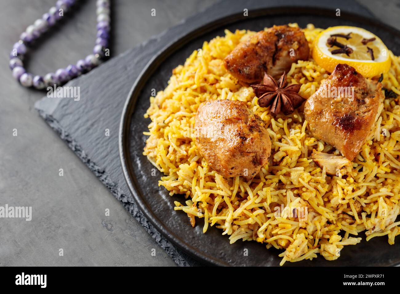Chicken Biryani for Ramadan Iftar with basmati rice on Black Plate ...