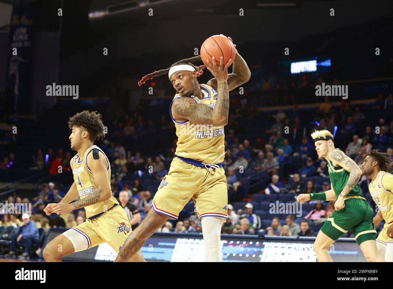 Tulsa guard Cobe Williams (24) pulls down a rebound against South ...