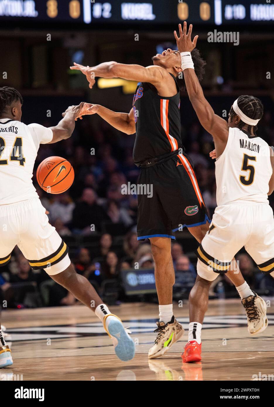 Nashville, Tennessee, USA. 9th Mar, 2024. Florida Gators guard Zyon Pullin (0) losses possession ...