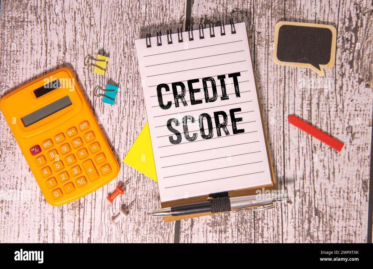 CREDIT SCORE text on a sticky note on cork board with pencil Stock ...